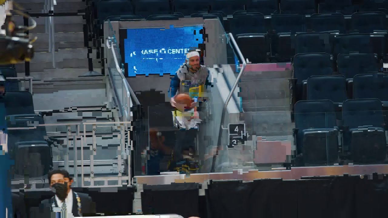 Steph Curry hits a warmup shot from the stands at Chase Center ahead of ...