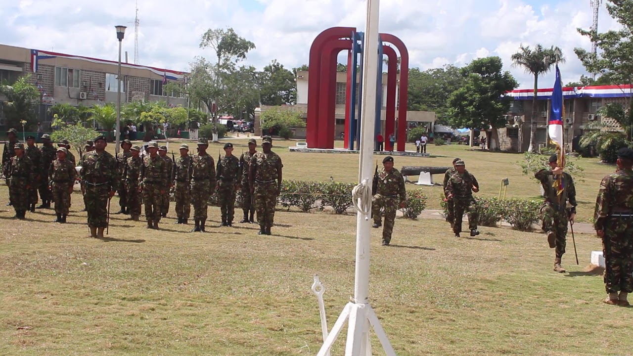 Members of the Belize Defence Force march in - YouTube