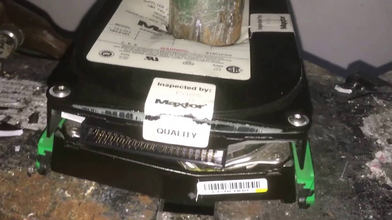 Crushing a 212MB hard drive! - YouTube