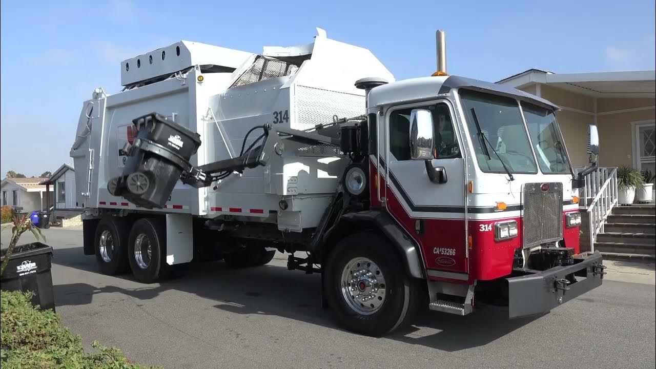 UWS’s New Peterbilt 320 Heil Python - YouTube