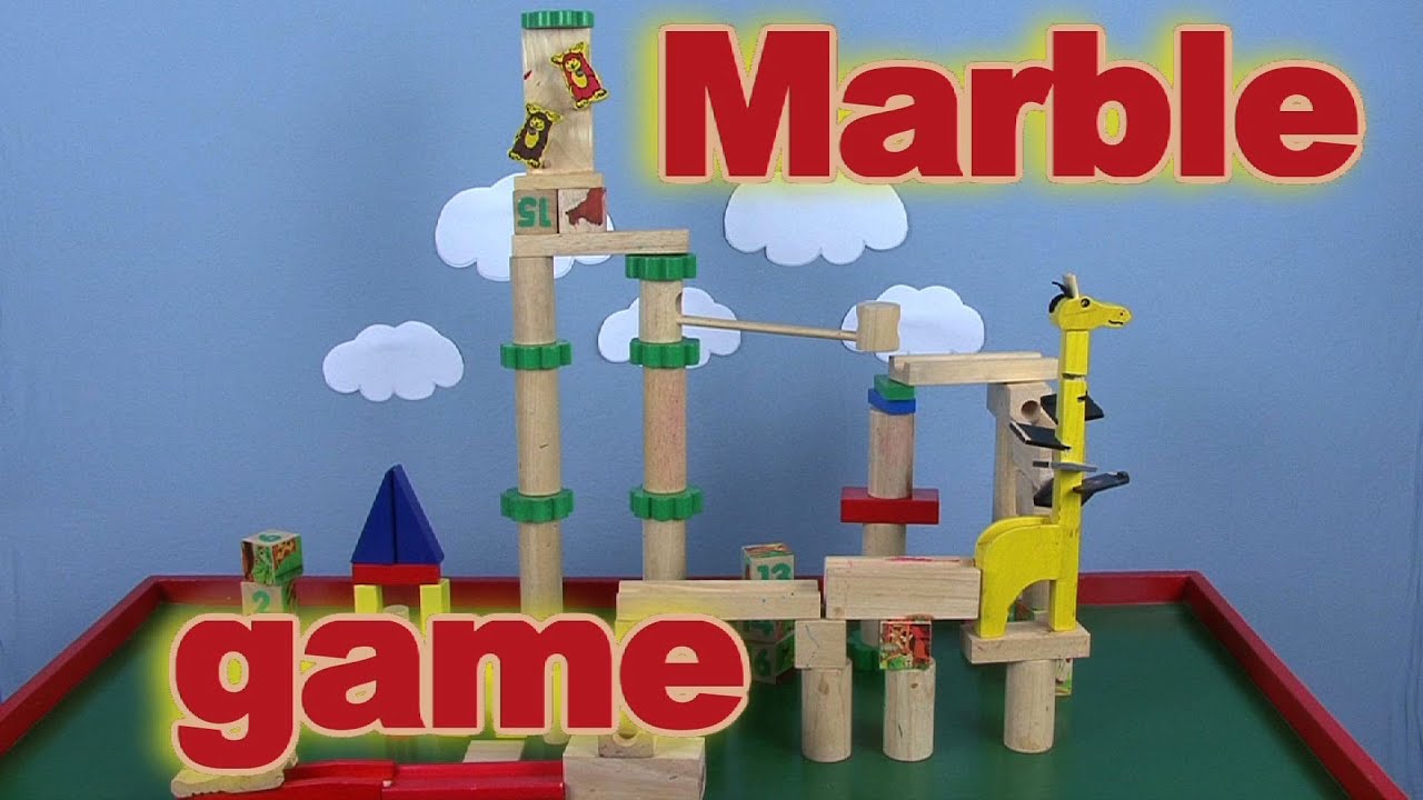 Marble run game with wooden blocks - YouTube
