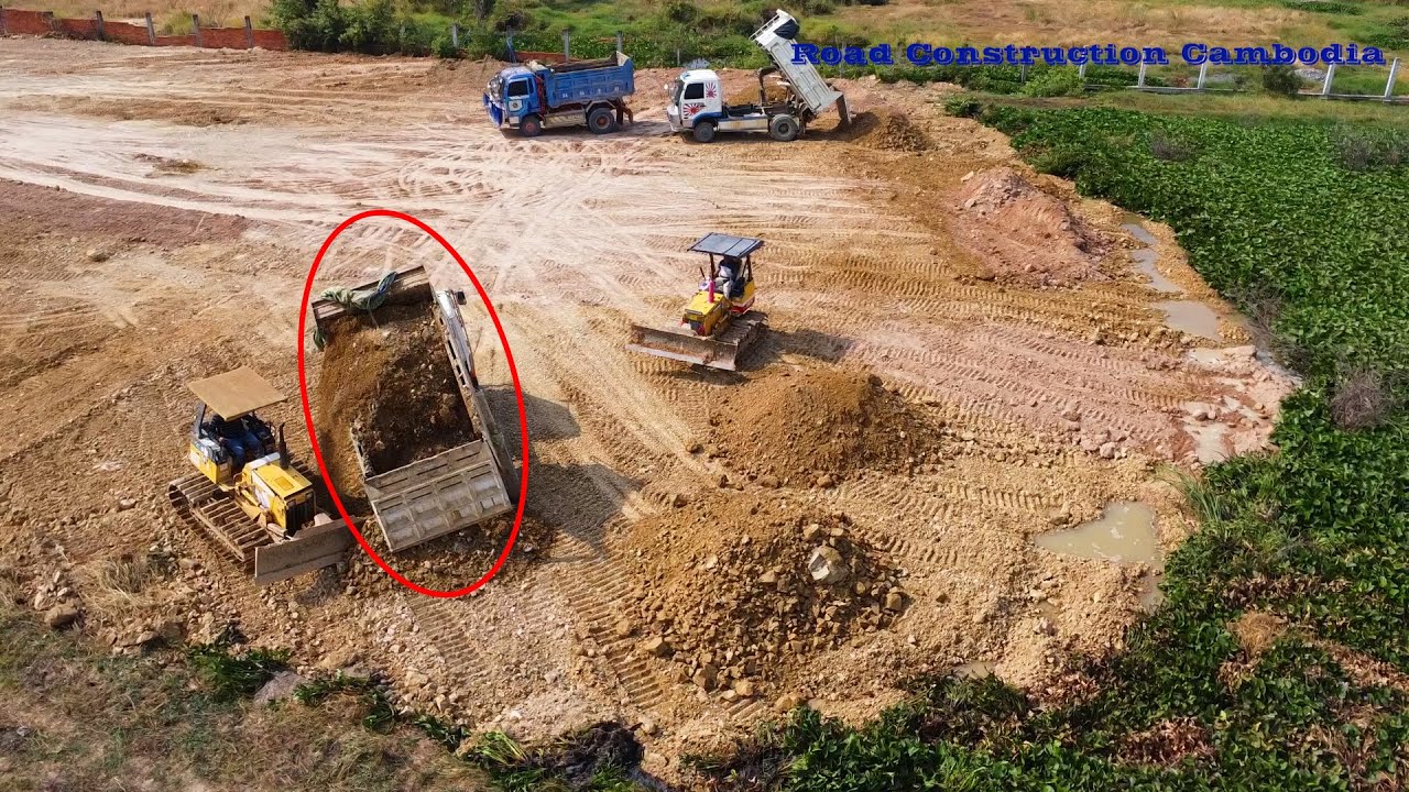 Back Fill Pond By D20P KOMATSU Dozer Pushing Dirt To Slop Water And ...