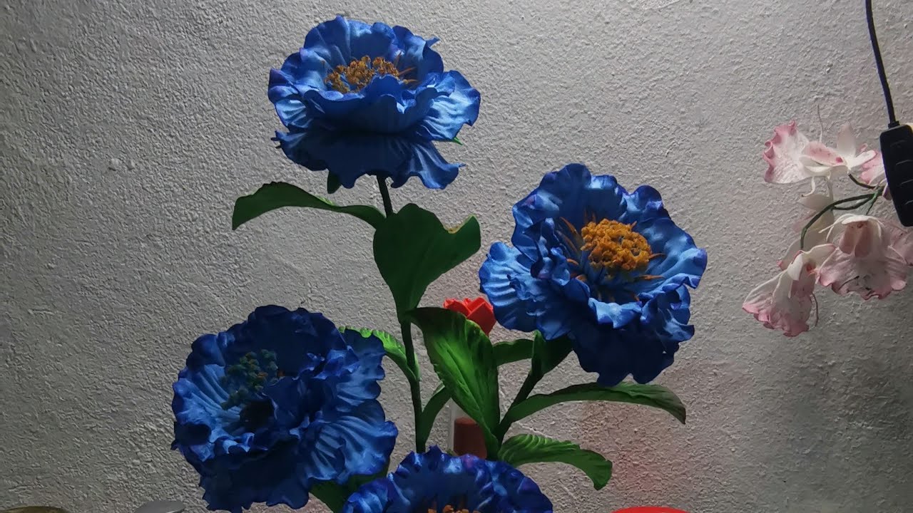 como fazer uma linda flor tango utilizando o frisador - YouTube