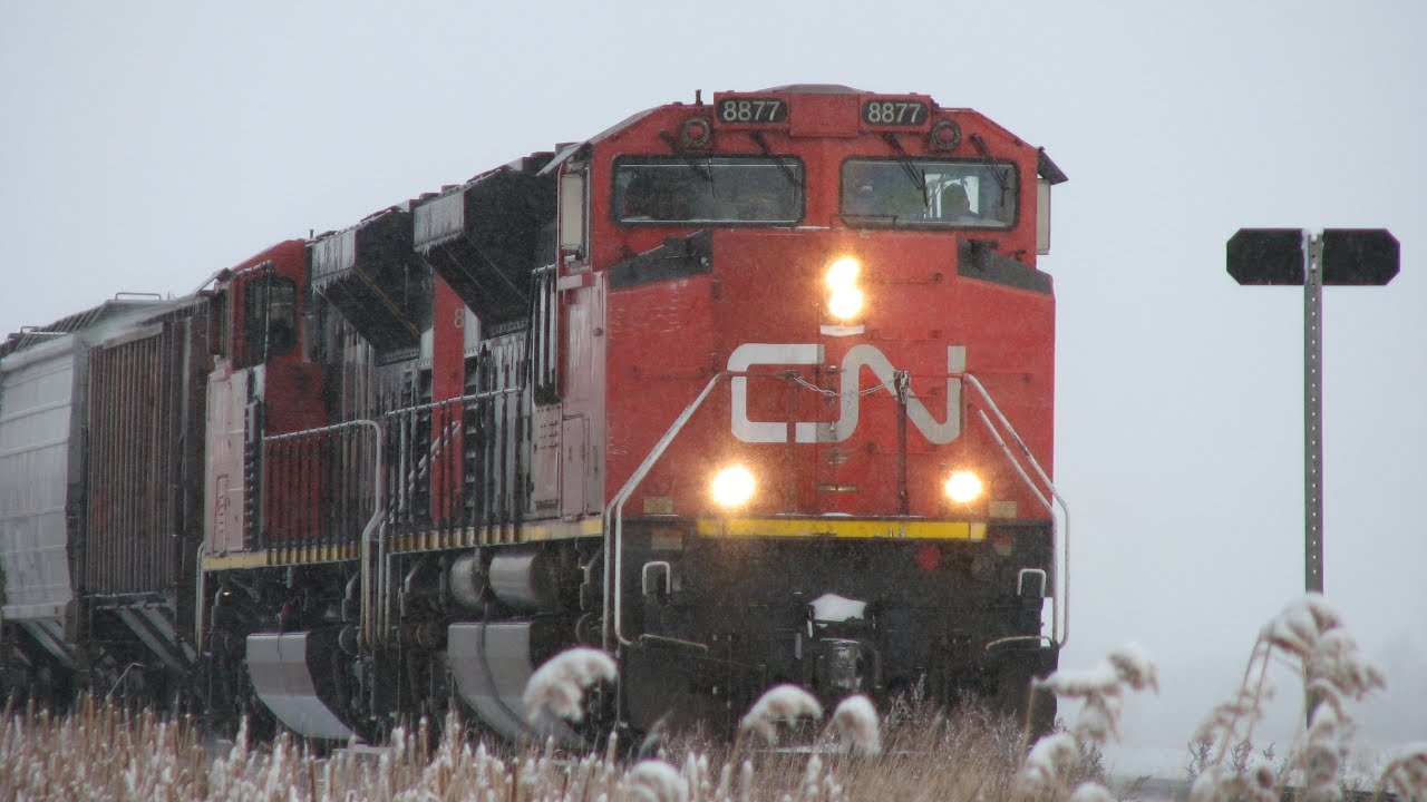 Watching CN trains on the Rivers Sub - YouTube