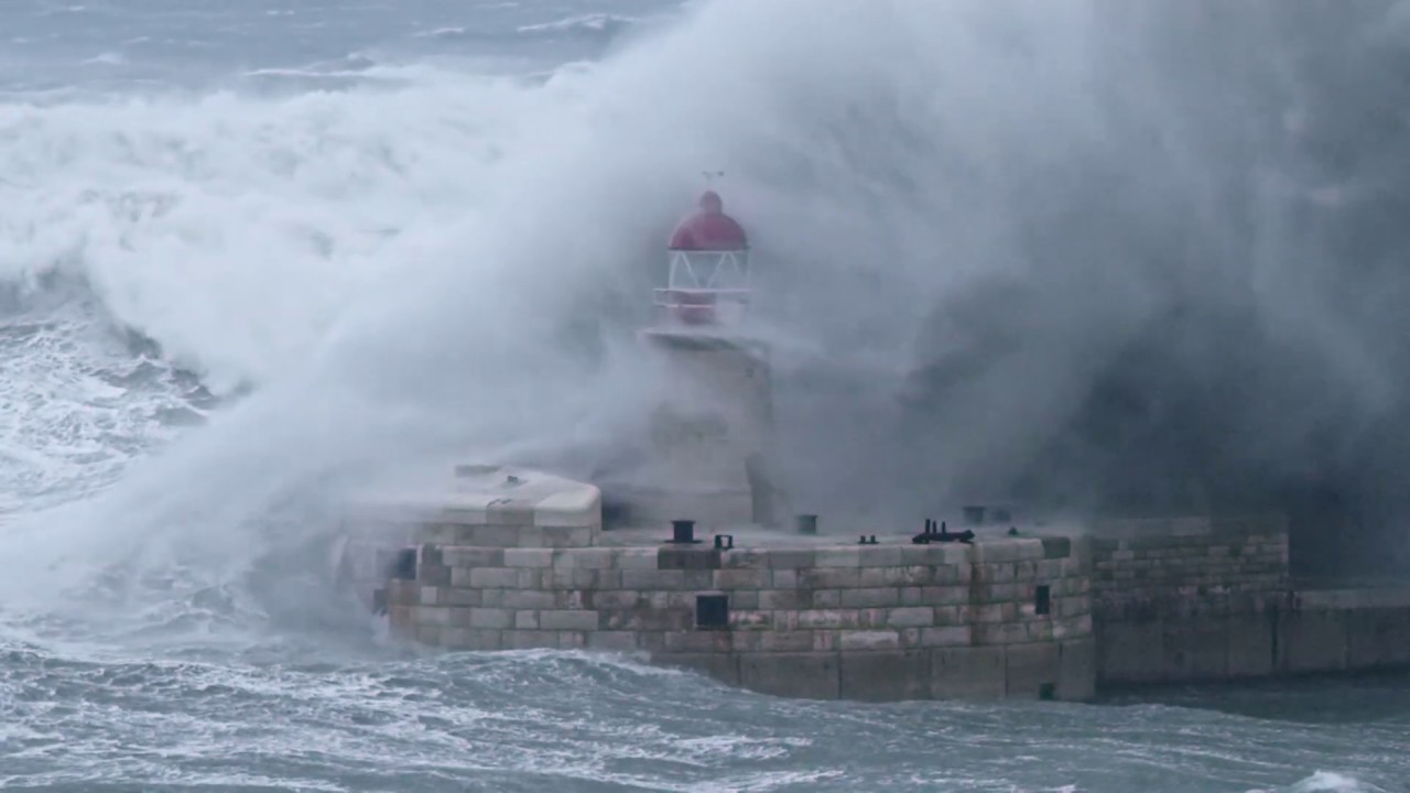 Massive Waves Hitting Lighthouse