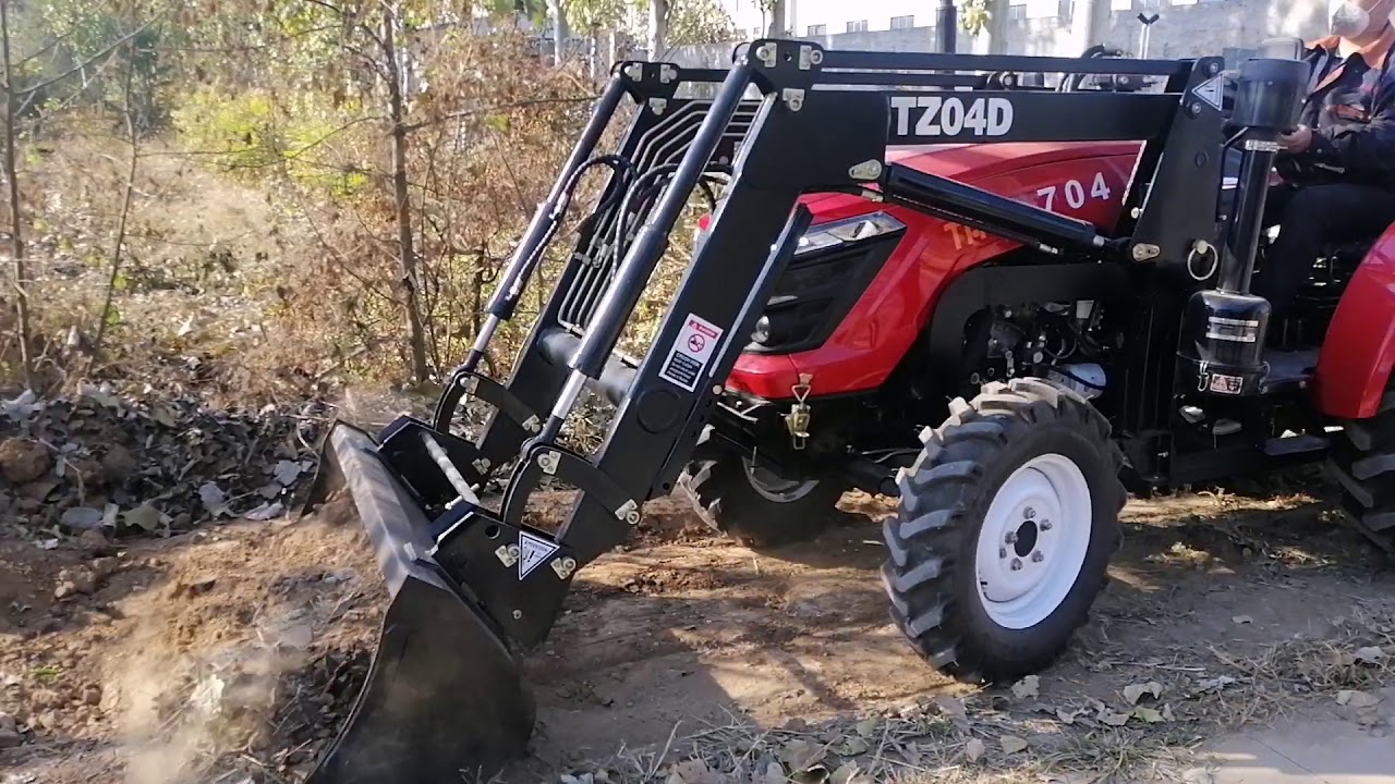 704 70hp front end loader working TAVOL tractor - YouTube
