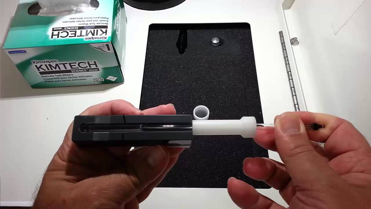 Placing a sample into the NMR - YouTube