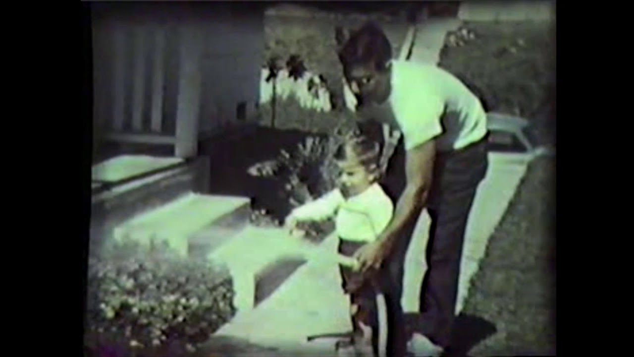 Philip mowing the strip lawn - YouTube