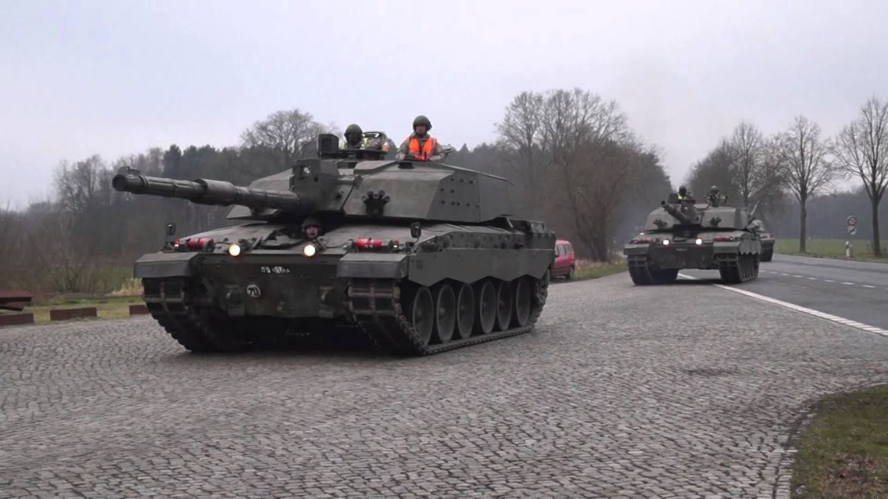 Challenger 2 main battle tanks driving by - YouTube