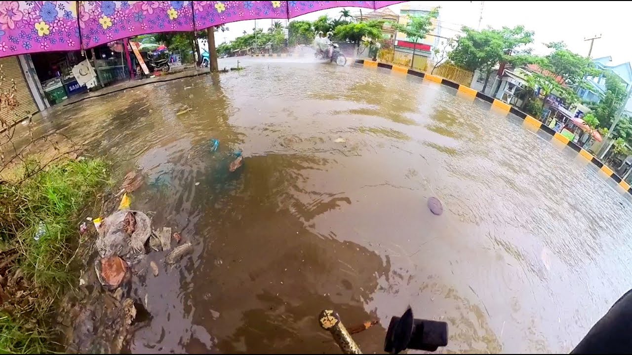 Remove Trash And Plastic Clogged Culvert Drain Flood Rain On Street ...