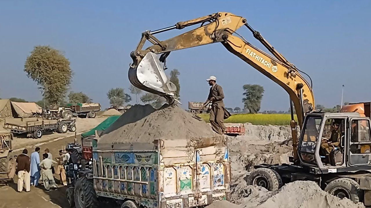 Powerful Excavator At Work: Excavator Load Trucks With Sand | Excavator ...
