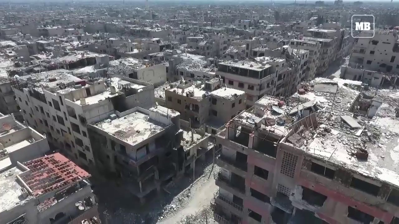 Drone footage shows destruction in Syria's Douma - YouTube