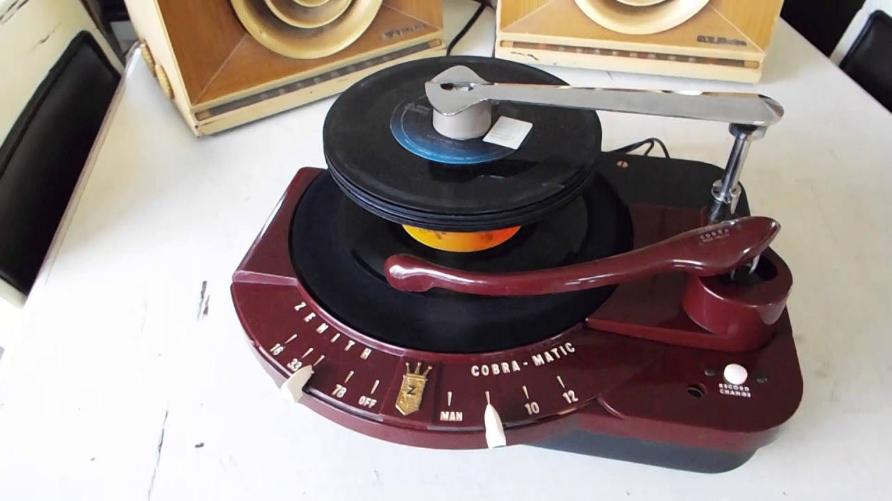 Zenith Cobramatic record changer playing a stack of 45 RPM records ...