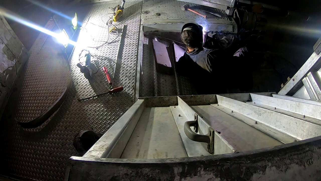 Welding on a cow trailer - YouTube