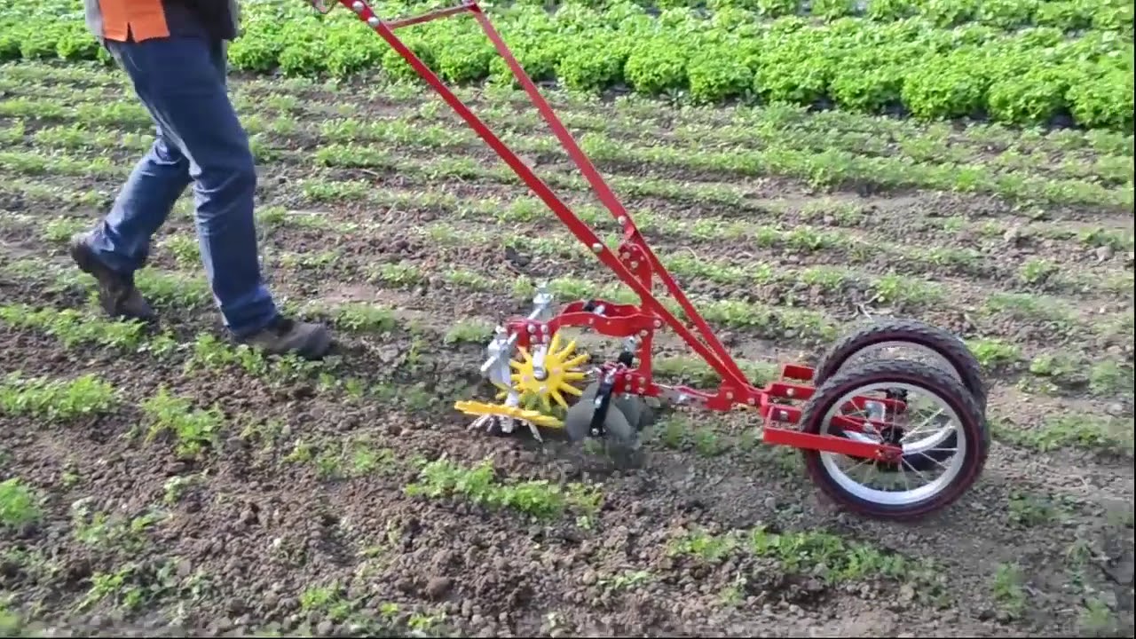 Use the Finger Weeder Wheelhoe for fast weeding in your farm - YouTube
