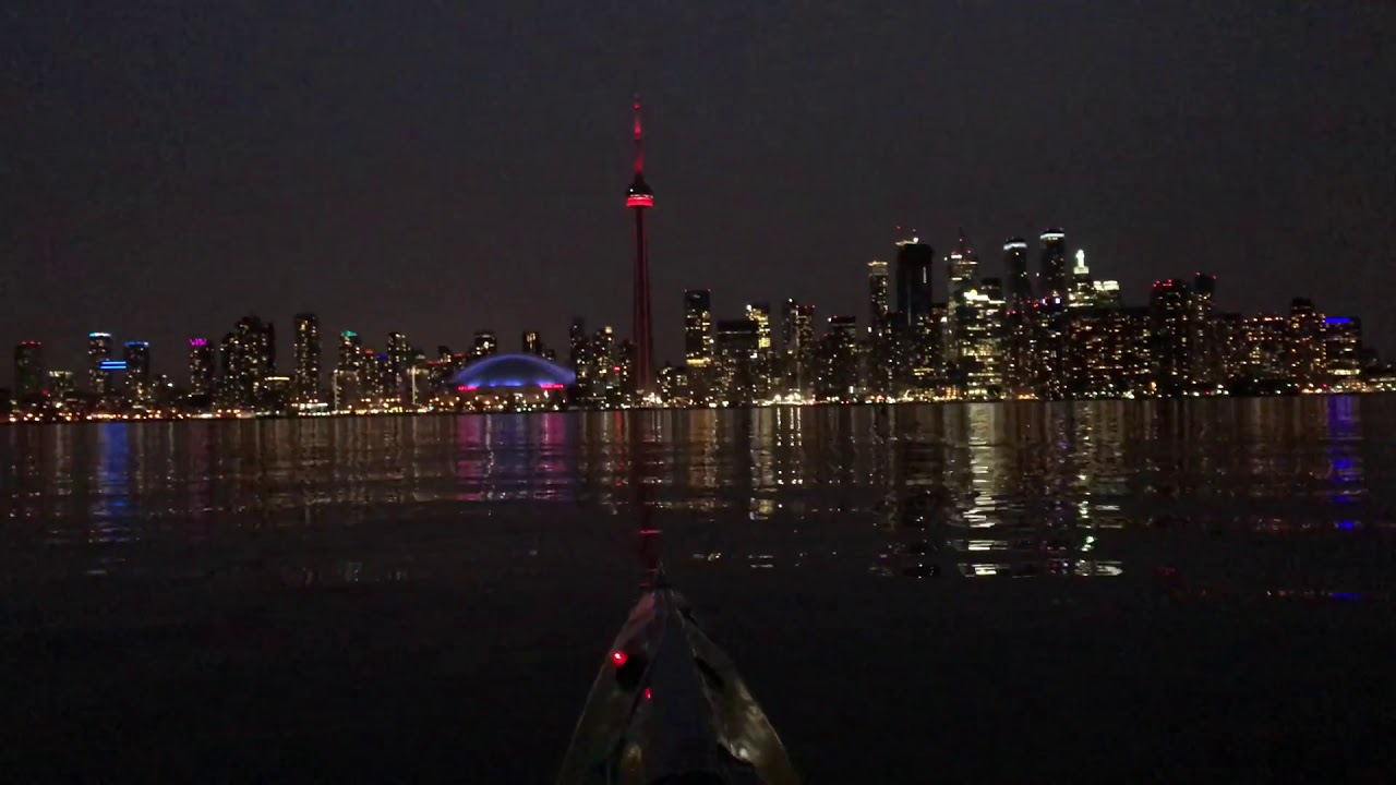 Paddling into Toronto Harbor at night. - YouTube