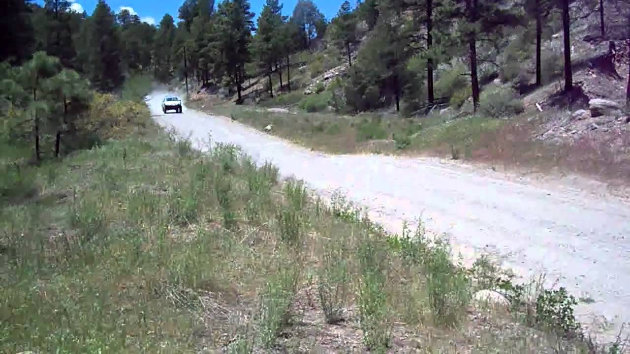 nissan frontier with long travel front suspension - YouTube