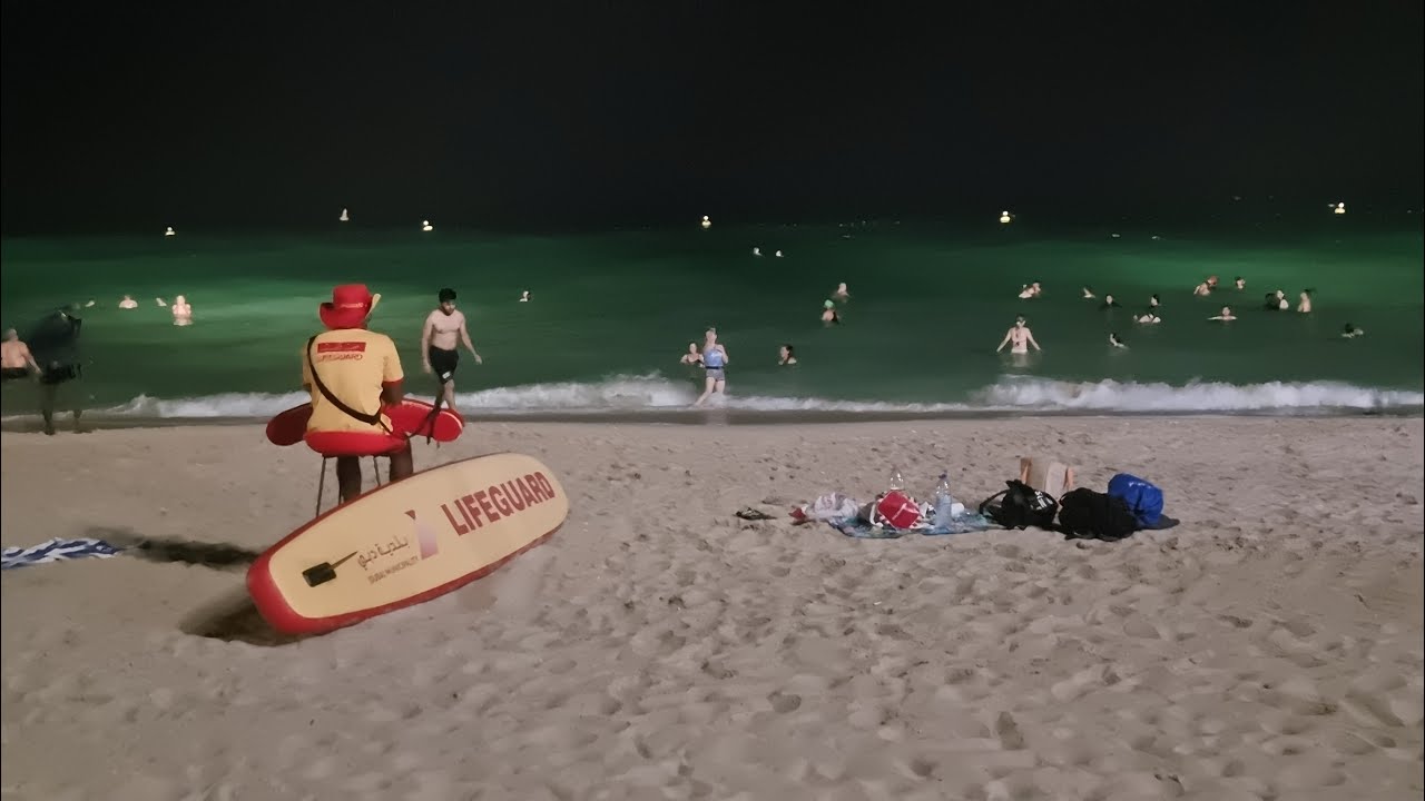Dubai Umm Suqeim beach walk: Kite Beach night swim with flood light ...