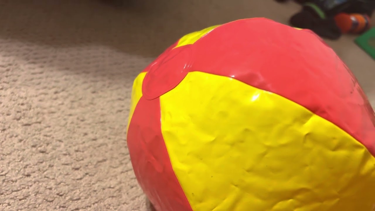 Inflating uno beach ball using a super wubble bubble air pump - YouTube