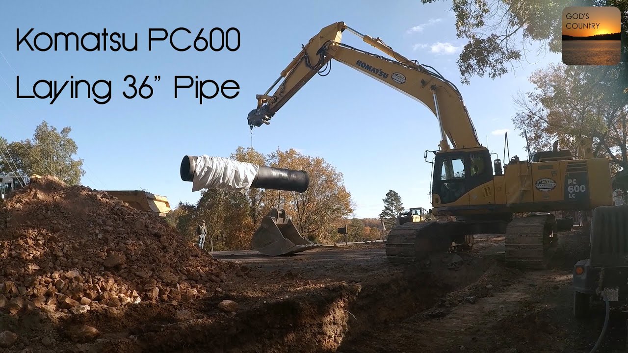 Komatsu PC600 Laying 36" Waterline and PC228 with Remu Screening Bucket ...