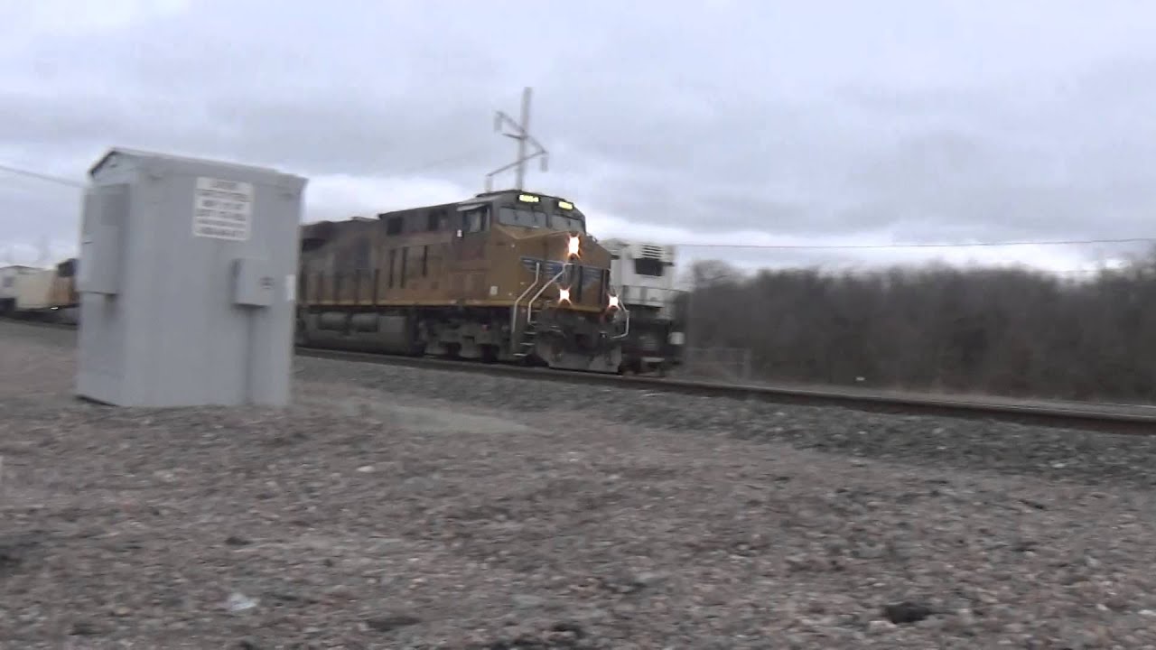 a short UP intermodal train with 3 locomotives in Sterling illinois ...