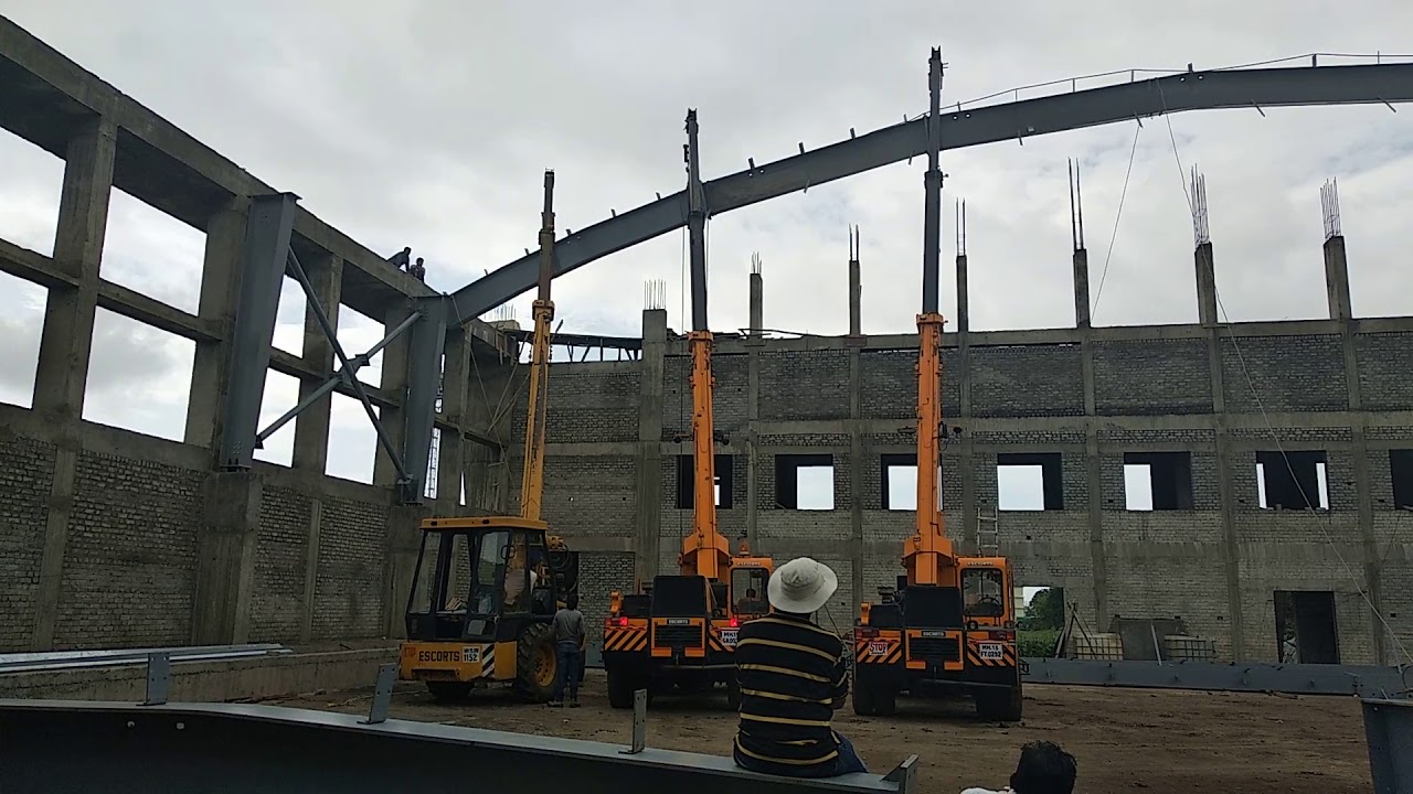 Rafter erection pre engineering building construction - YouTube
