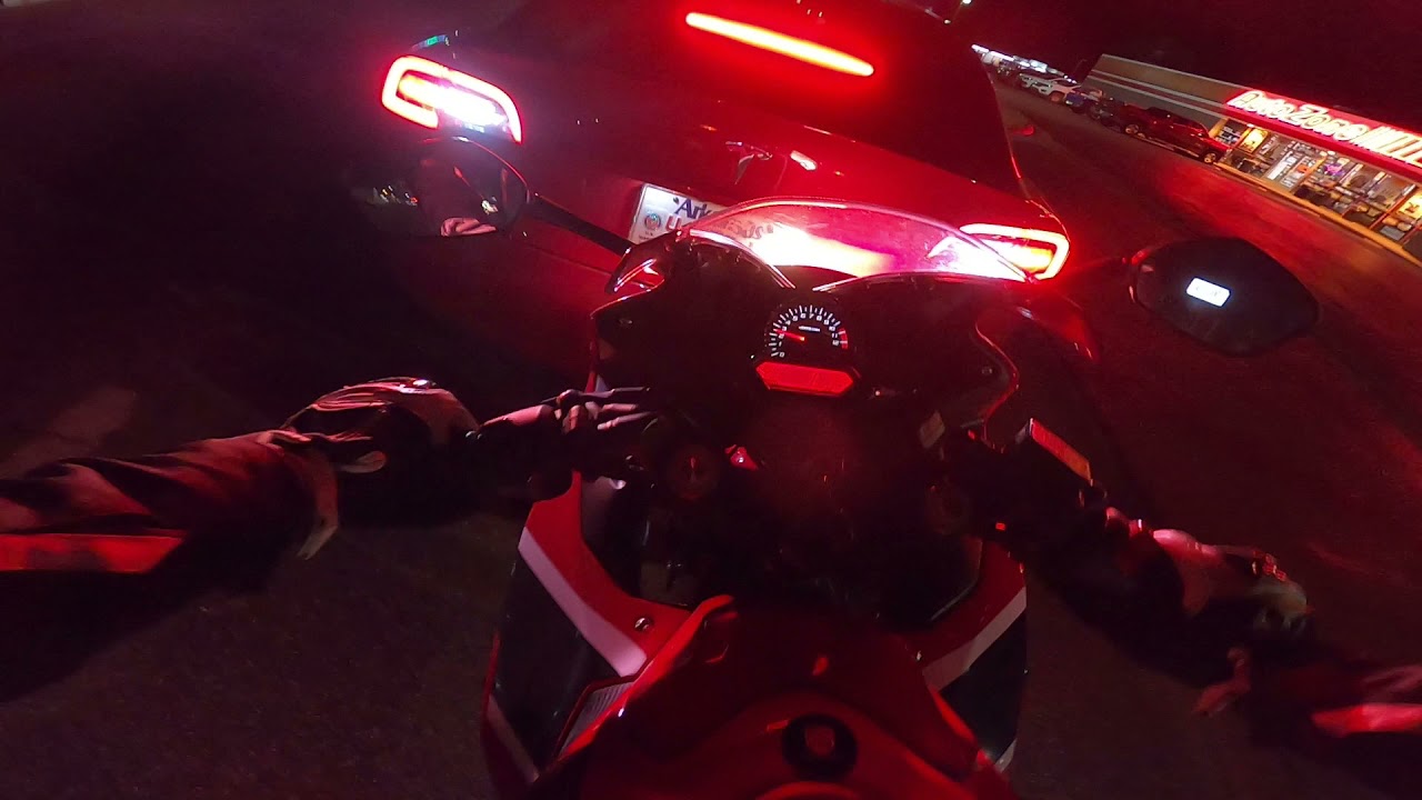 Tesla reverses and almost hits motorcycle - YouTube