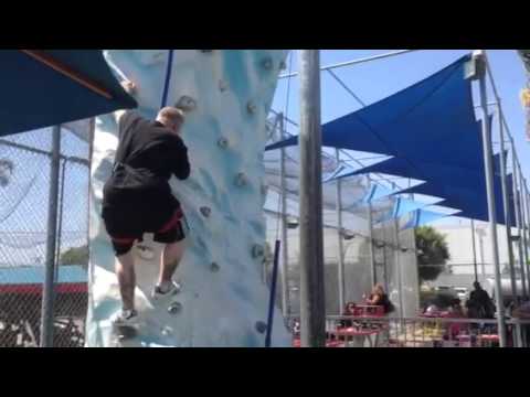 Another fat guy thinking he can climb a rock wall - YouTube