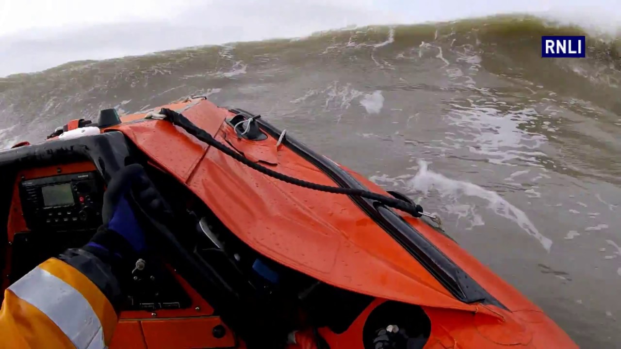 Porthcawl RNLI D Class Lifeboat training in surf at Rest Bay - YouTube