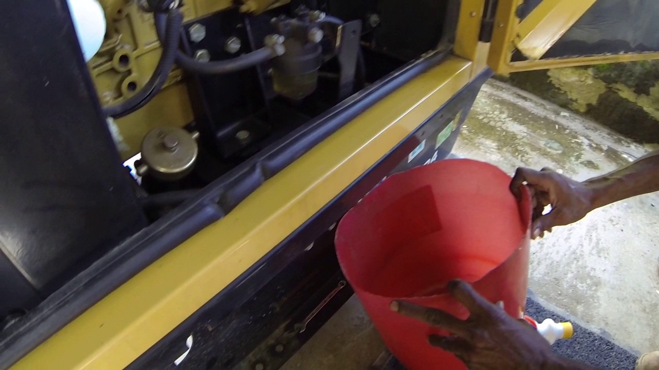 Olympian Generator drain plug removal 11 kva - YouTube