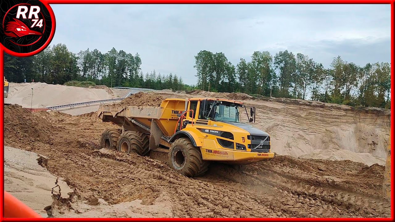 Volvo a30 dumper with terra tires i wet clay hard at work - YouTube