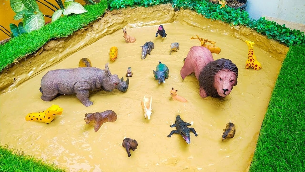 Sandbox Safari Showdown: African Rhinoceros, Wild Lions, and More Stuck ...