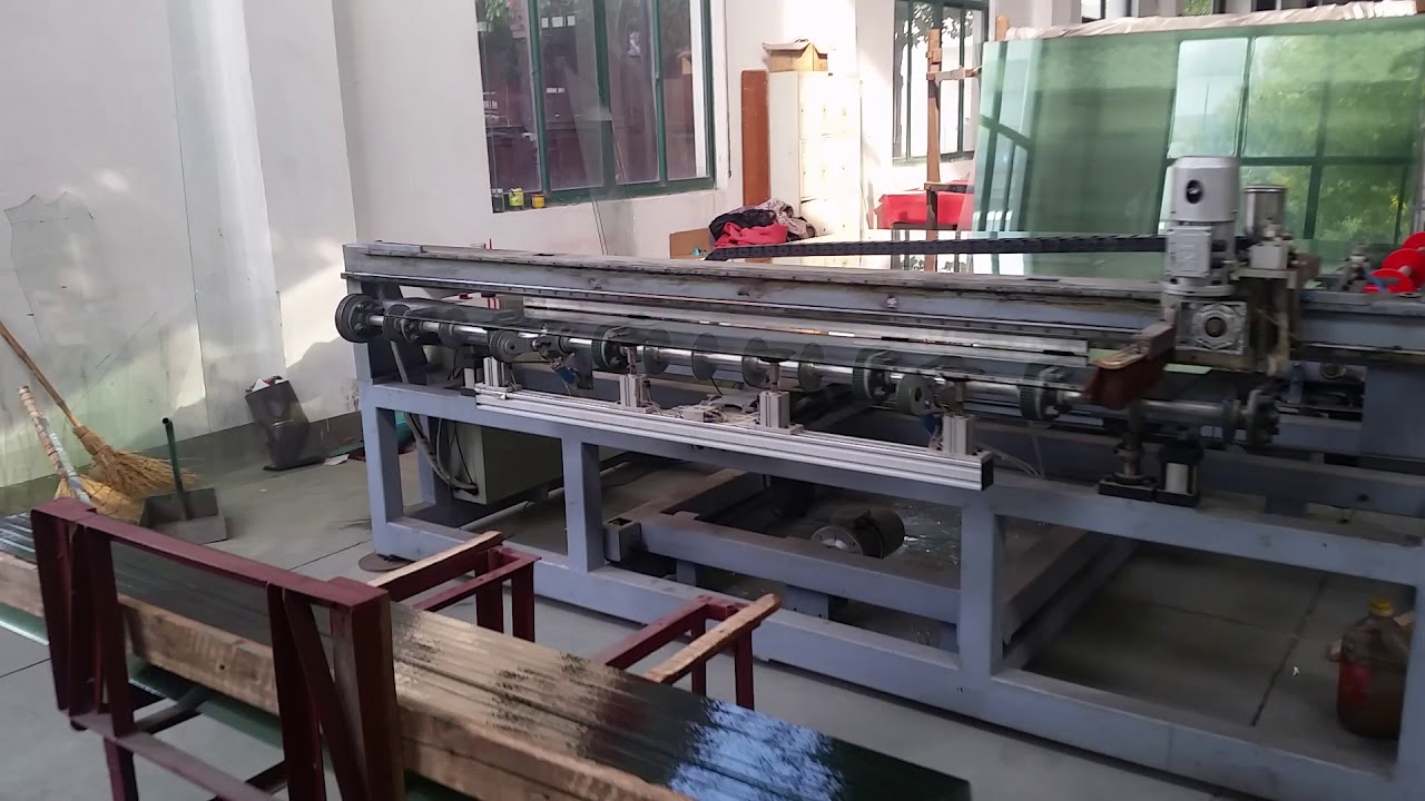 Auto slitting machine for glass 2 position - YouTube