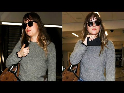 News: Dakota Johnson spotted at LA airport 03.04.18