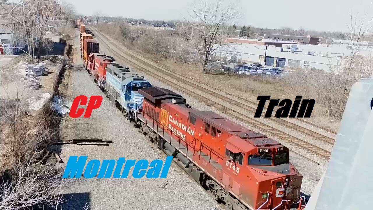 4 13 23 EASTBOUND CP TRAIN IN OUTREMONT MONTREAL SEEN FROM ROCKLAND ST BRIDGE - YouTube