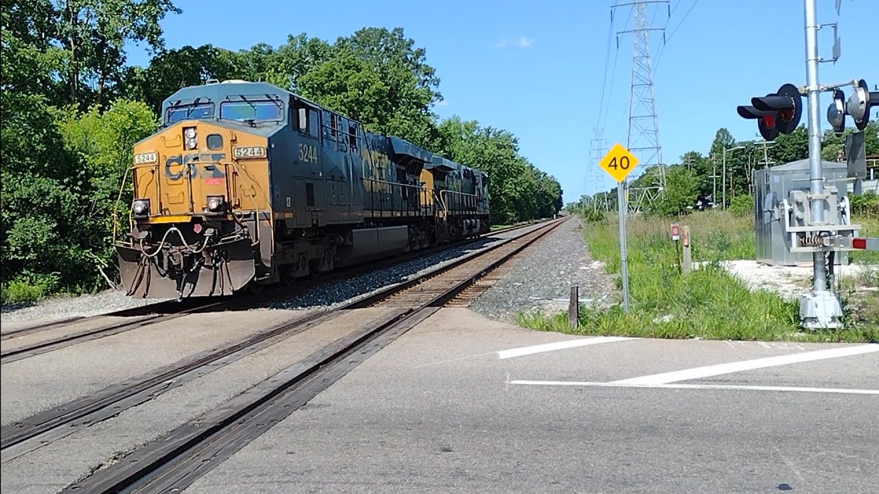 CSX 5244 ES40DC & CSX 362 CW44AC on the CSX Detroit subdivision with a ...