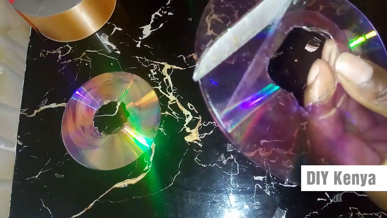 How to cut a CD / DVD into a circle | curtain holder - YouTube