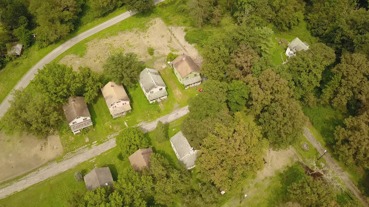 Uninhabited Houses at Yellow Dog Village - YouTube