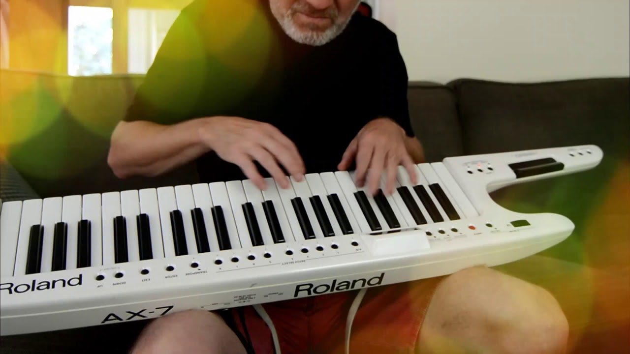 Trying out the Roland AX7 on bass sound - YouTube