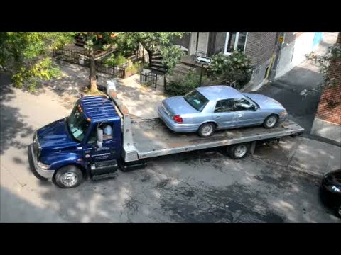 RUSTY CROWN VIC GOES ON FLATBED INTL. TRUCK - YouTube