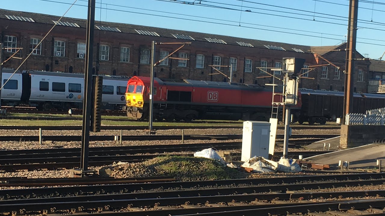 DB Cargo 66 021 passing Doncaster Station with a Scunthorpe Roxby ...