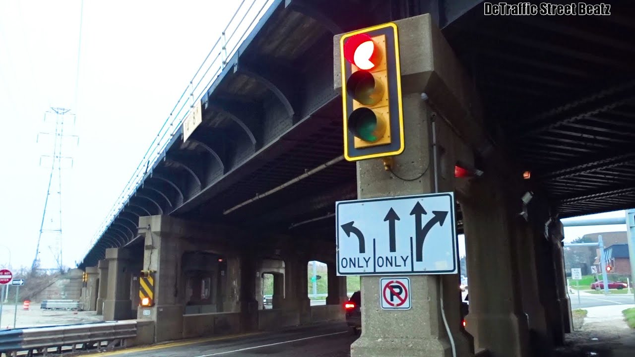 Traffic Lights & Advance Flashing Left Turn Signals Under Train Bridge ...