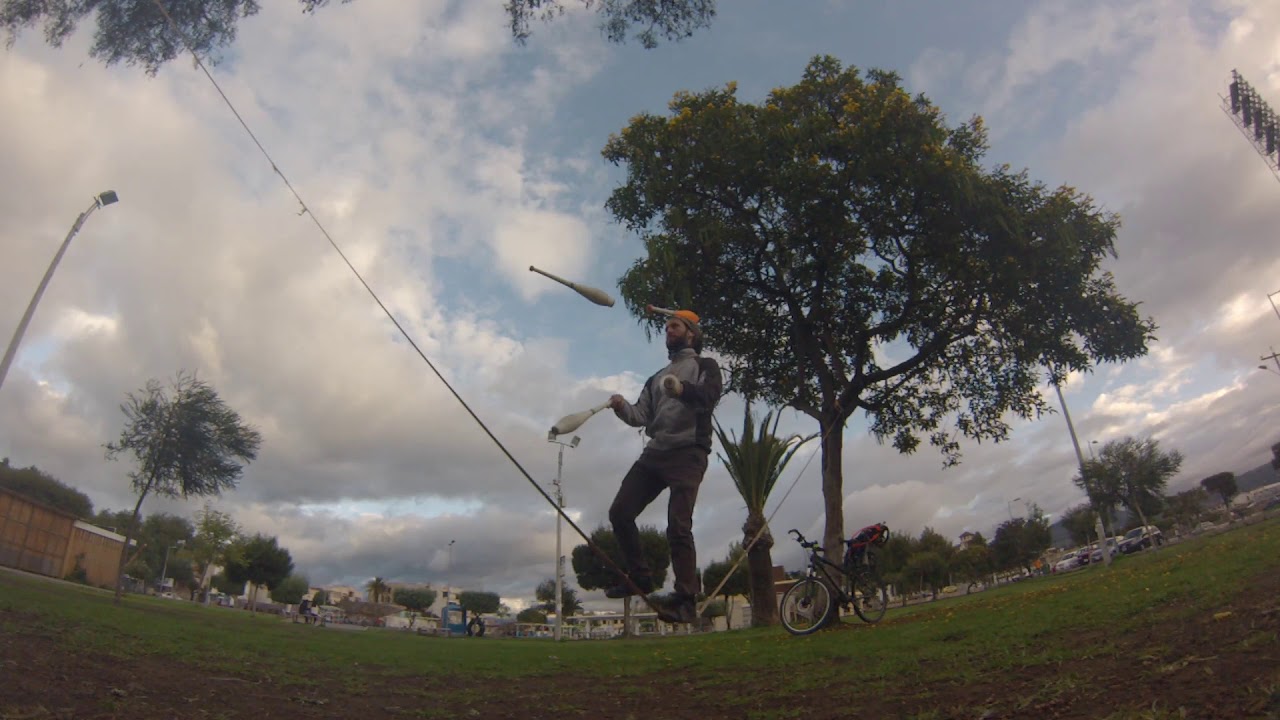 Club balance on head + 3 clubs juggling to 4 clubs juggling on ...