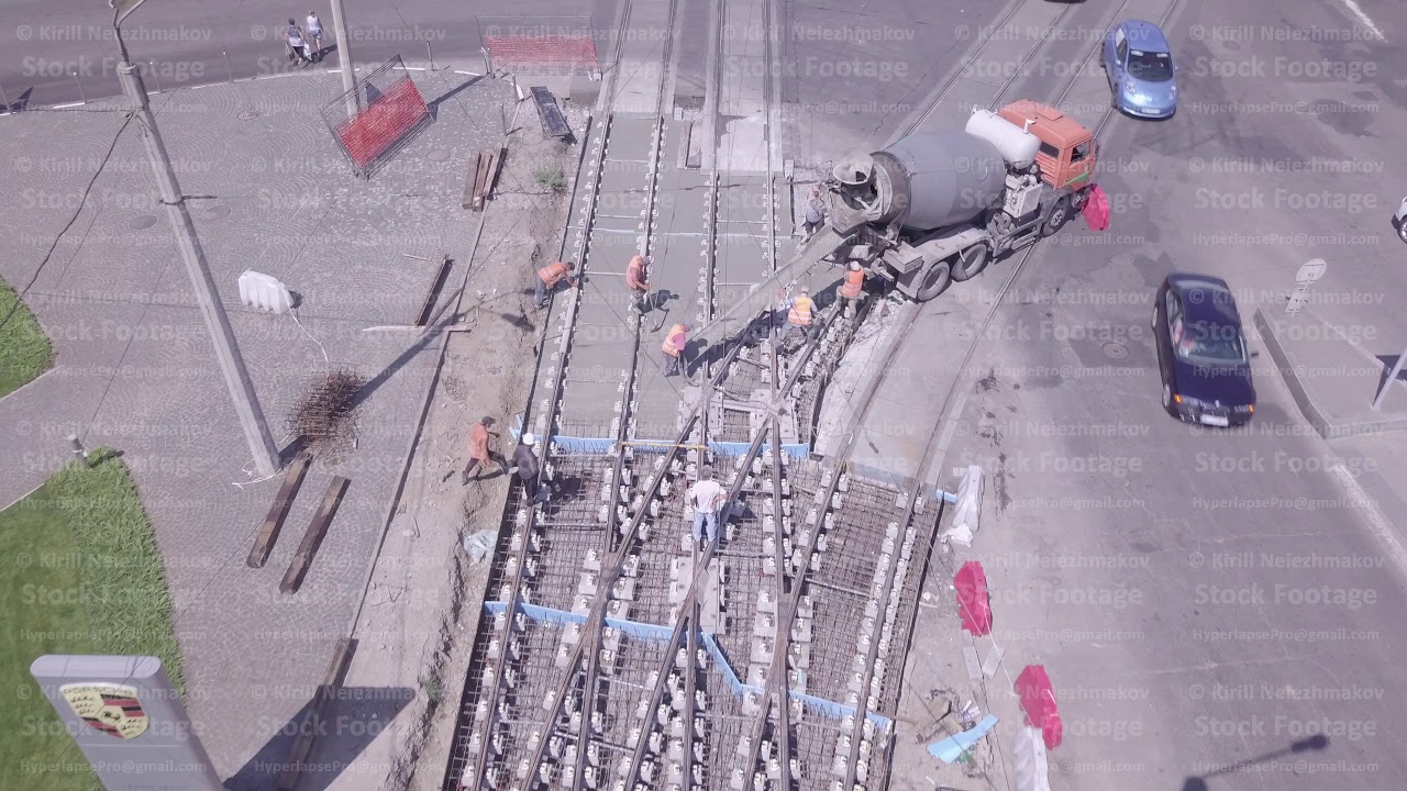 Road reconstruction with tram rails intersection, construction site ...
