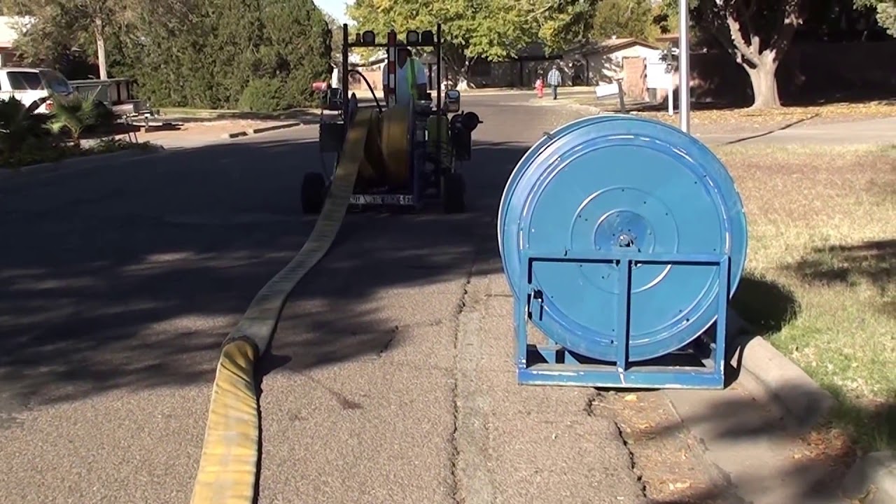 Water Main Flushing, One Man Connecting and Rolling out second NO DES ...