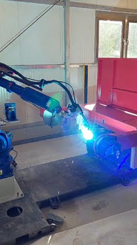 Robot welding cell with Fronius CMT Moto man NX 100 controll machine is ...