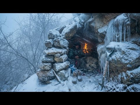 ​Winter Bushcraft in a Blizzard | Building a Stone Shelter Under a Cliff with My Dog