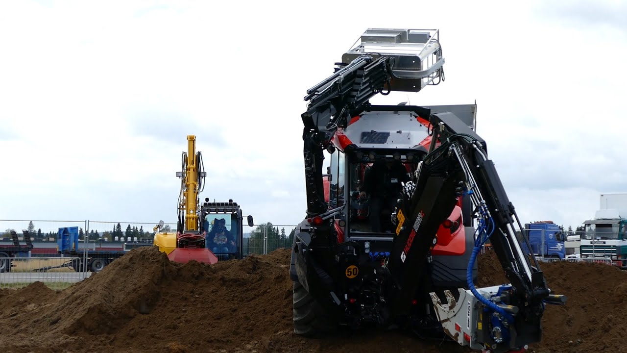 Huddig 1260C demo with pole erecting at Load up North 2014 - YouTube