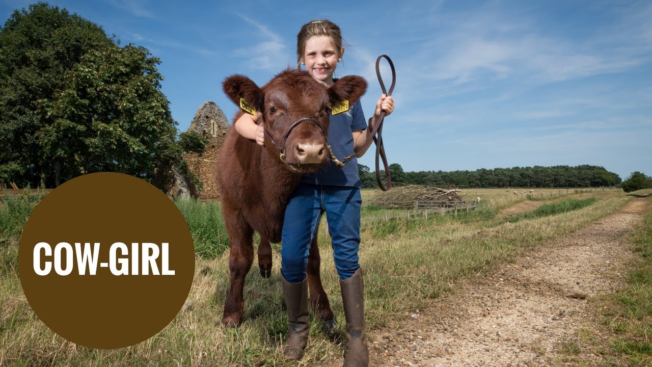 Real Life Cow Girl Forms Unique Bond With Calf - YouTube