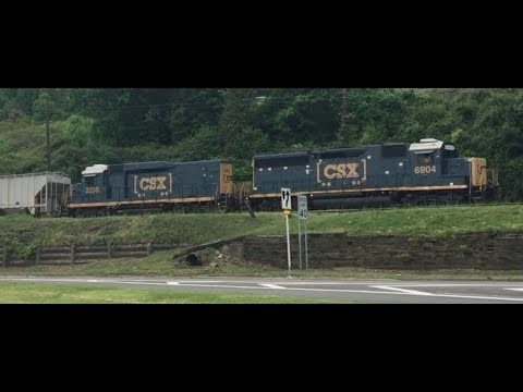 Road Slugs on CSX with a caboose and Milwaukee Road box car - YouTube